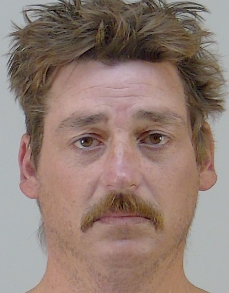 Leesburg man busted with stolen gun after nearly colliding with squad ...
