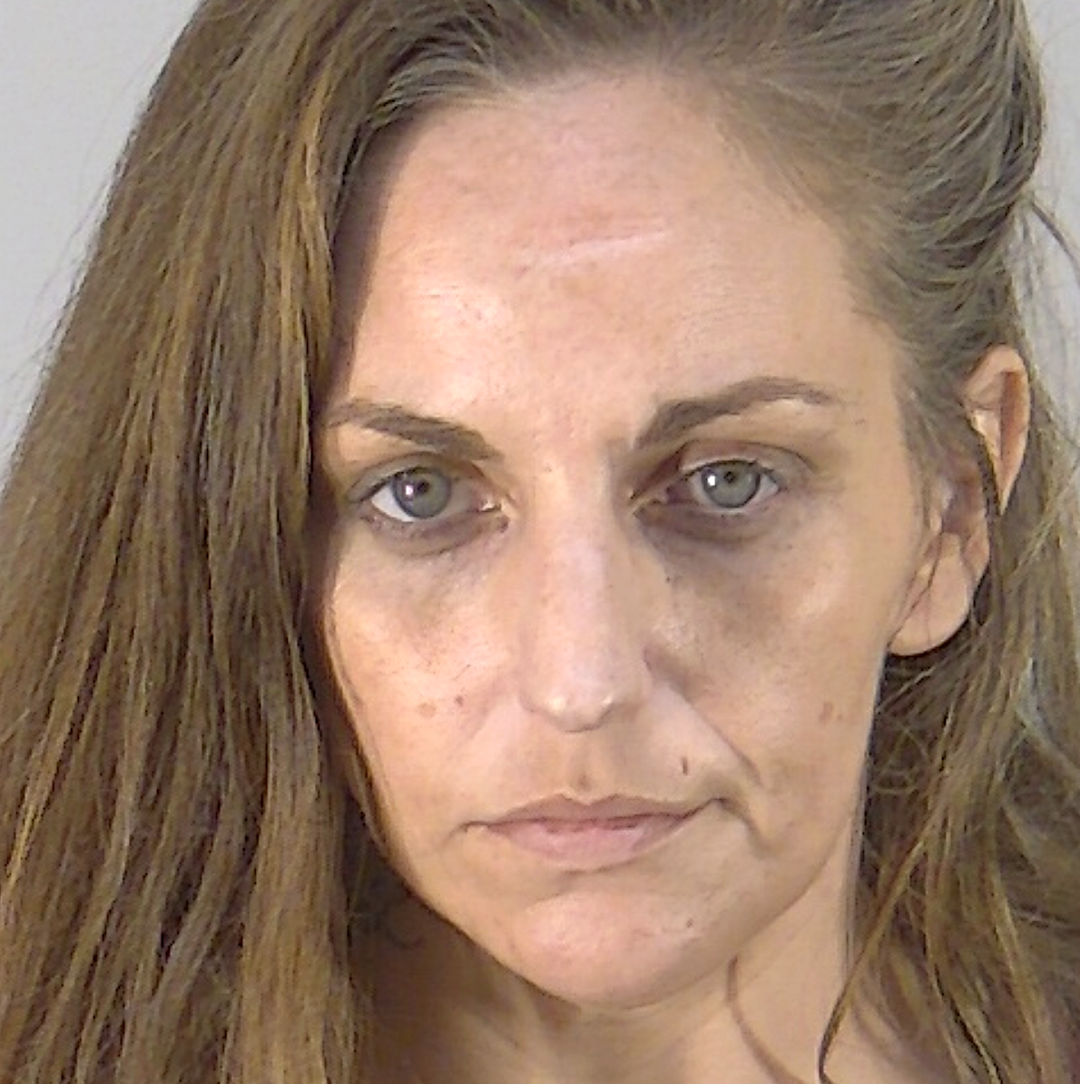 Bicyclist who ran stop sign pulls fentanyl out of her bra during ...